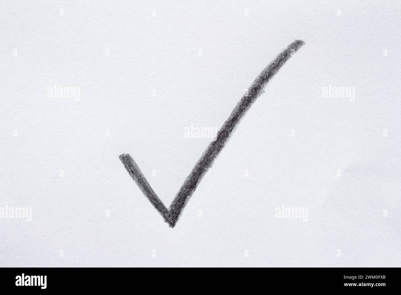 Hand drawn check mark on white paper Stock Photo - Alamy