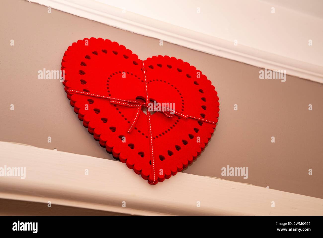 Red heart on a wall Stock Photo - Alamy