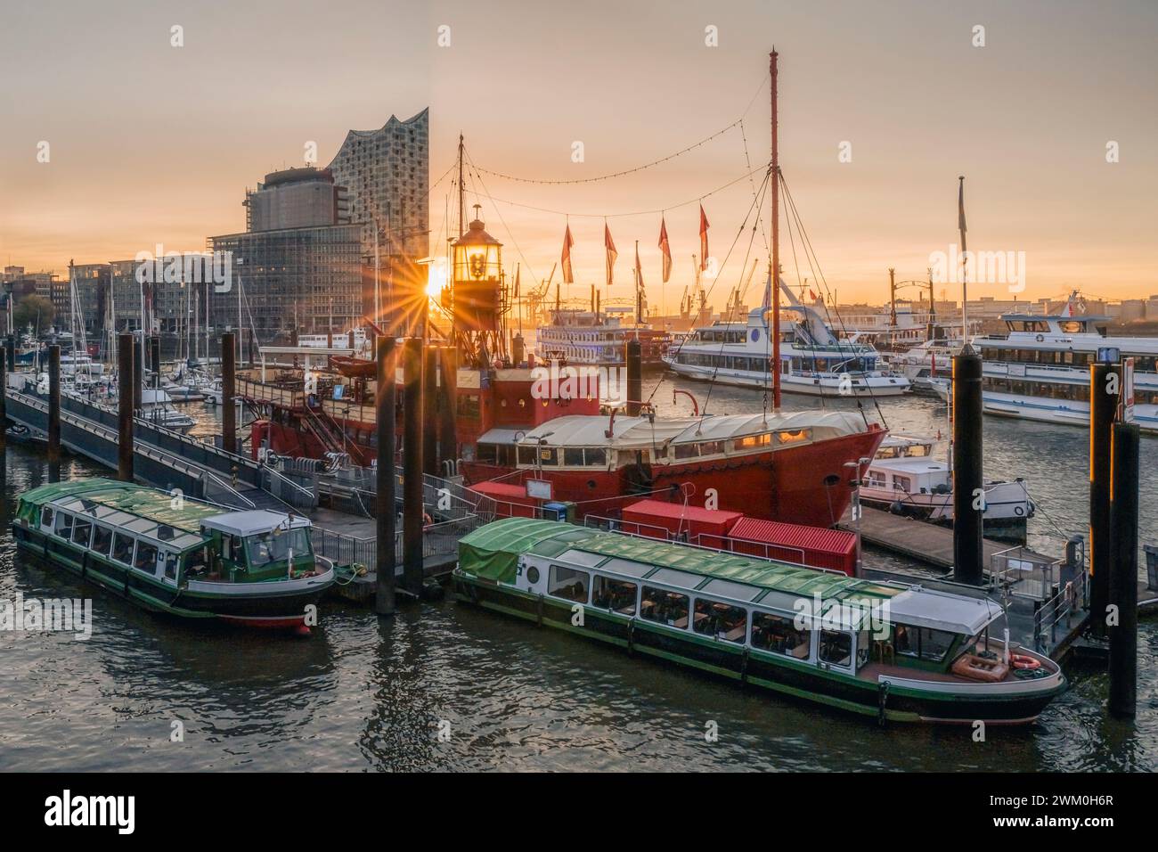 Germany, Hamburg, Boats moored in harbor at sunrise Stock Photo - Alamy