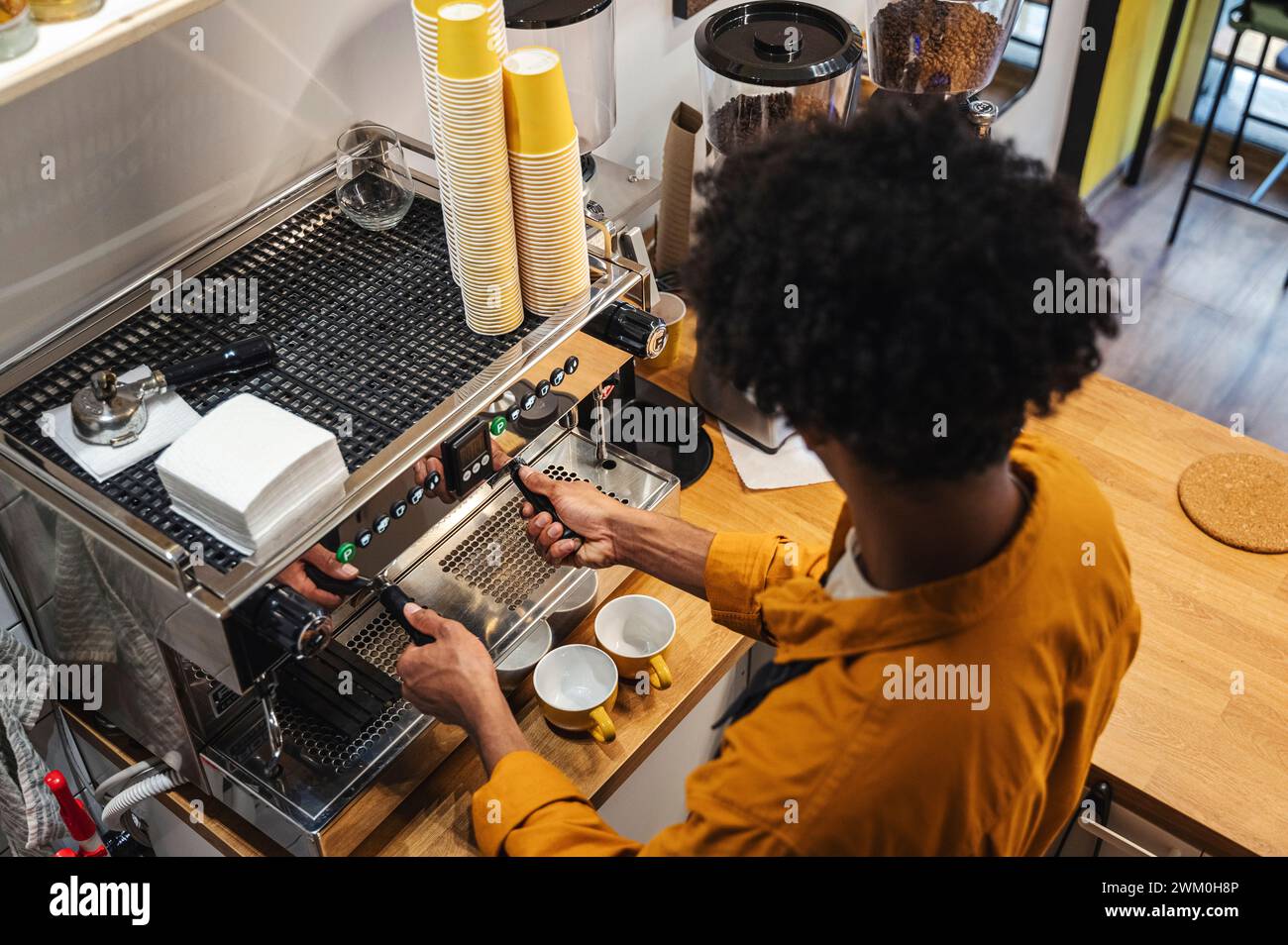 Man barista machine coffee hi-res stock photography and images - Alamy
