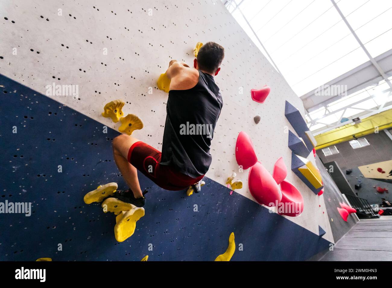Athlete climbing wall hi-res stock photography and images - Alamy