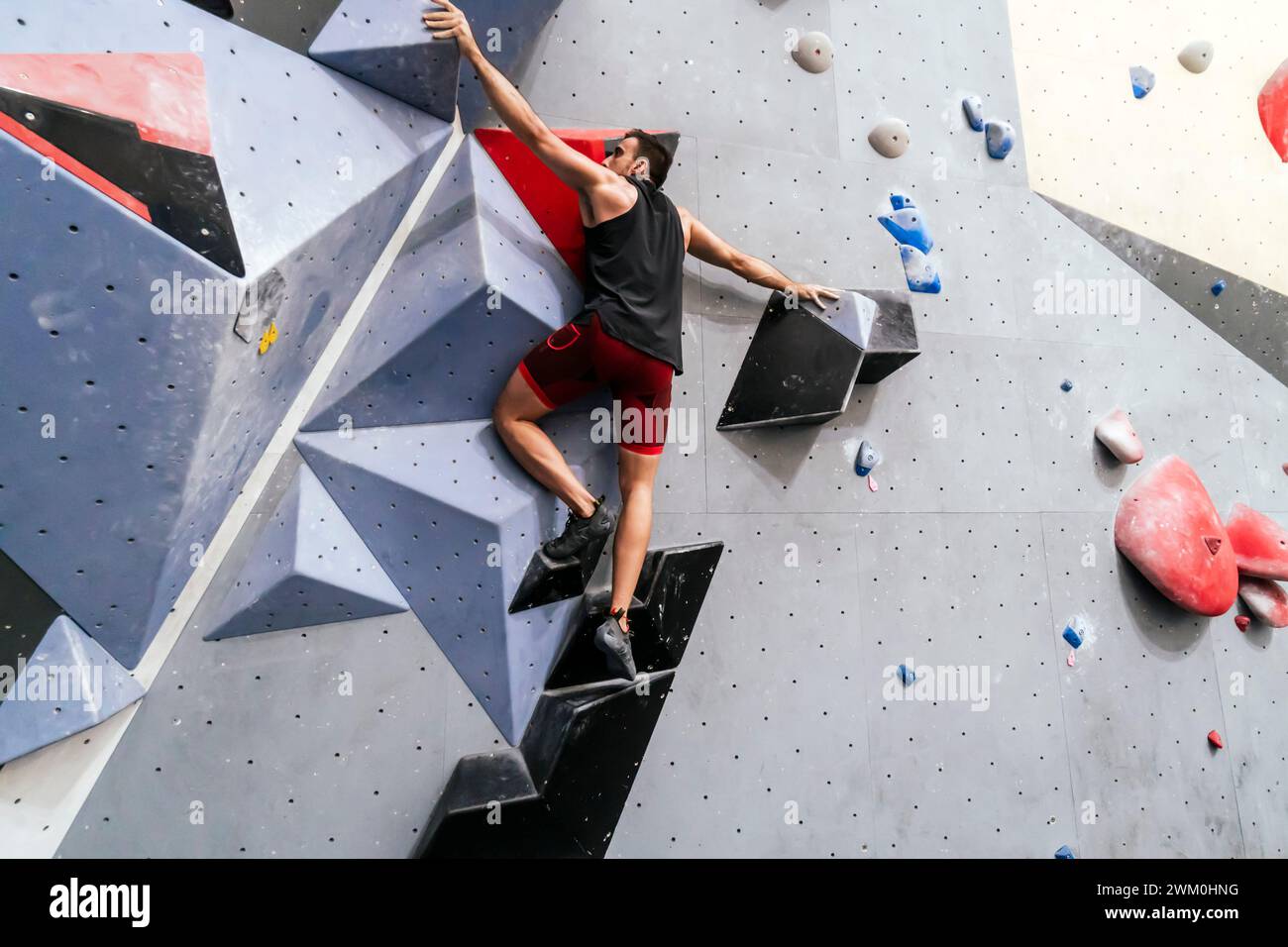 Athlete climbing wall hi-res stock photography and images - Alamy