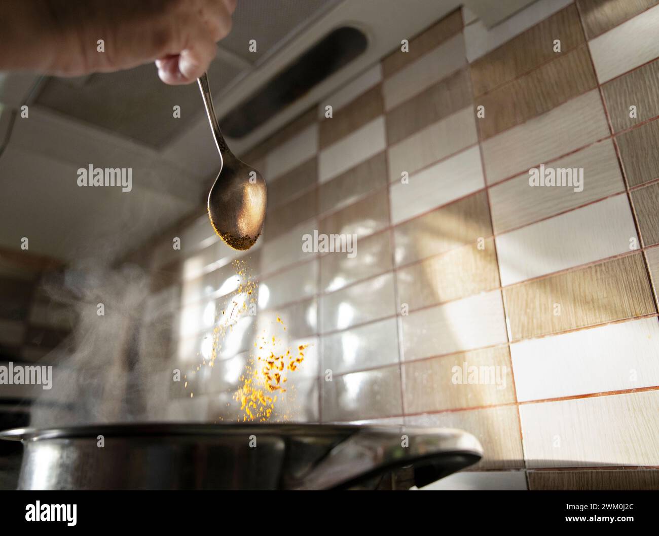 Hand pouring pot hi-res stock photography and images - Alamy