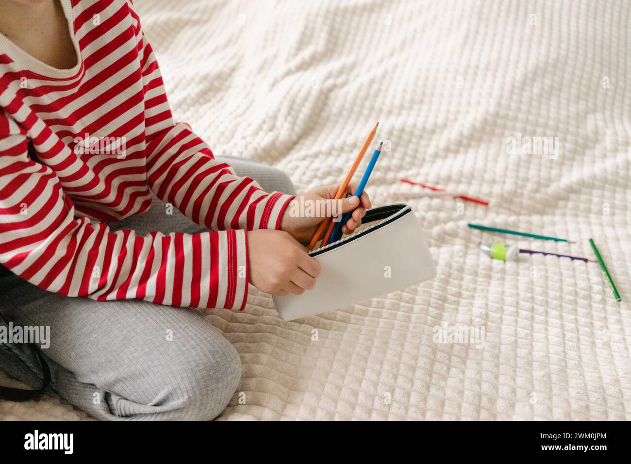 School girl putting supplies hi-res stock photography and images - Alamy