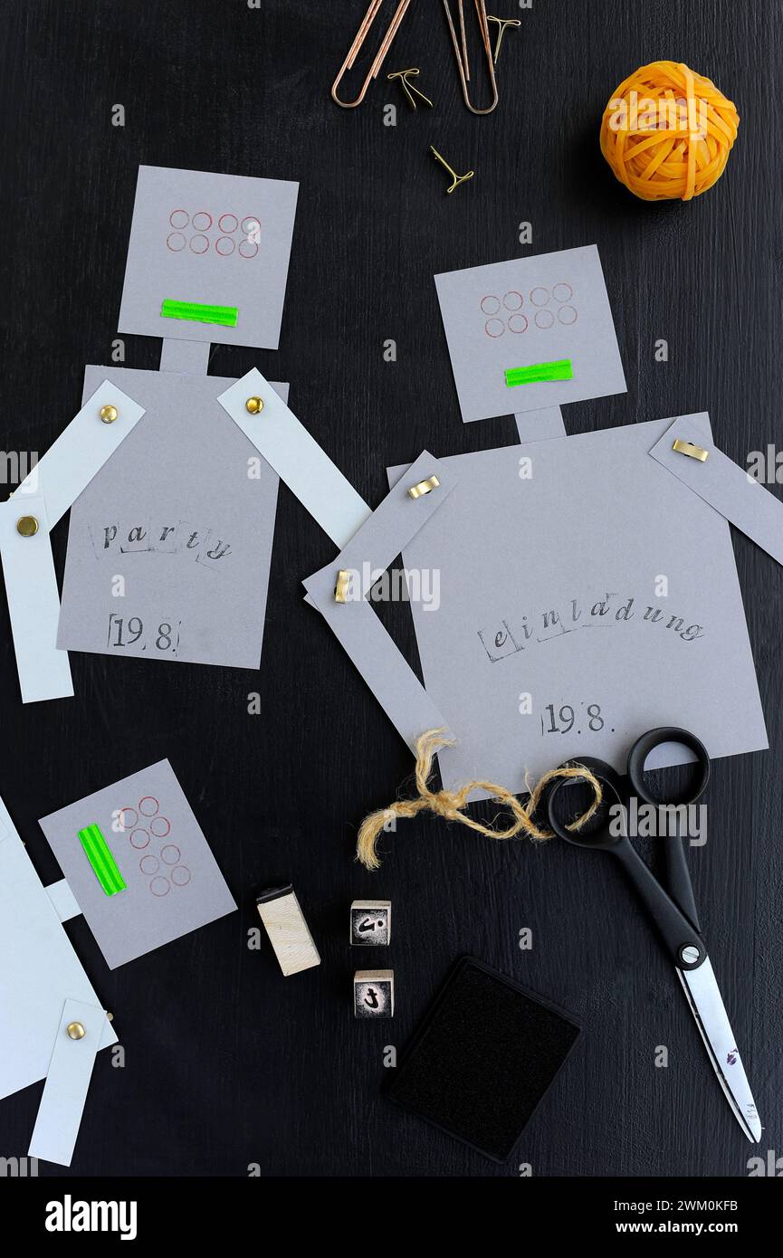 DIY robot shaped birthday invitation cards Stock Photo - Alamy