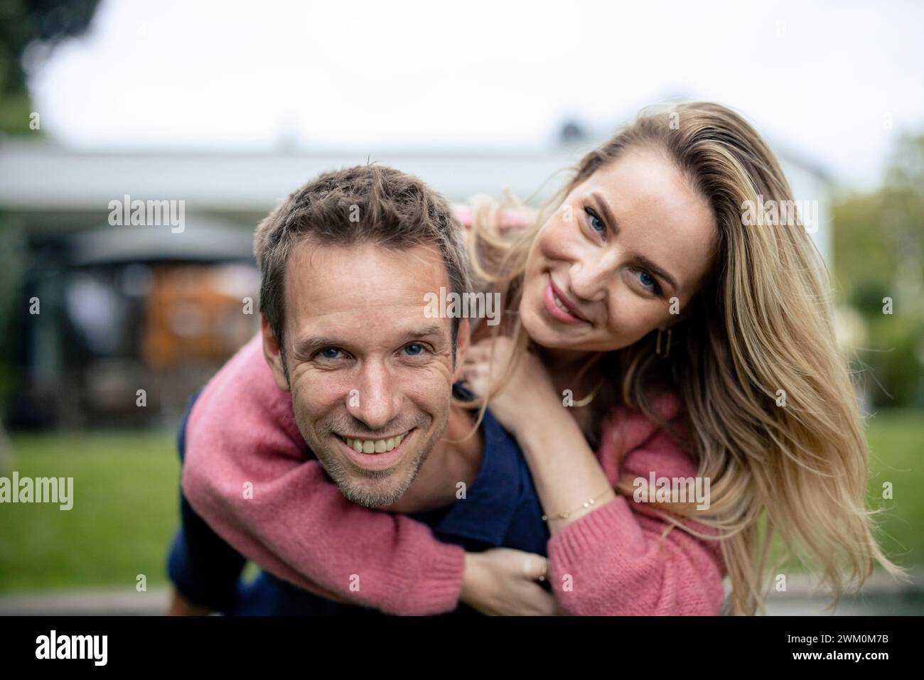 Mature woman giving piggyback ride hi-res stock photography and images ...
