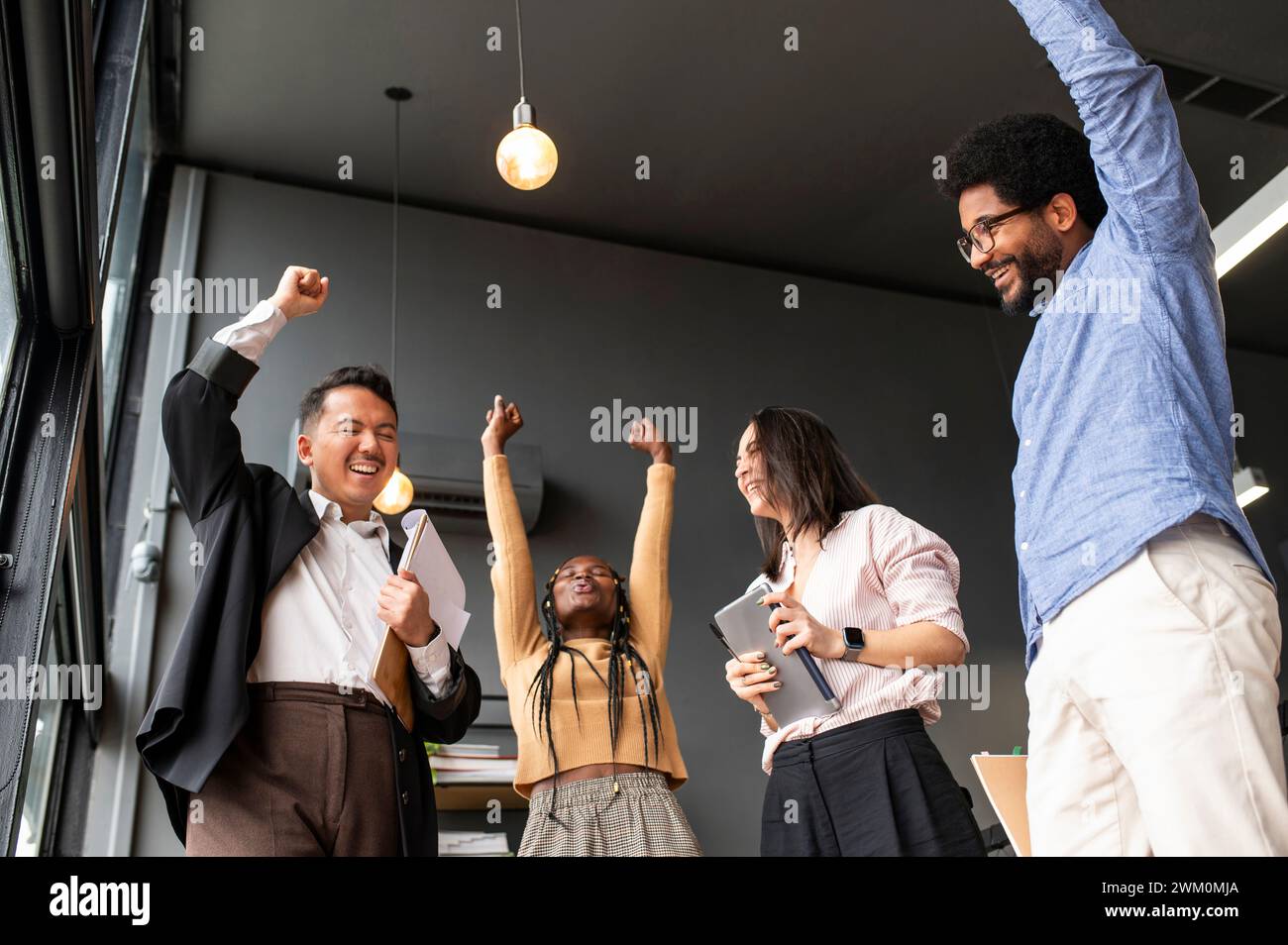 Business people celebrating success in hi-res stock photography and ...