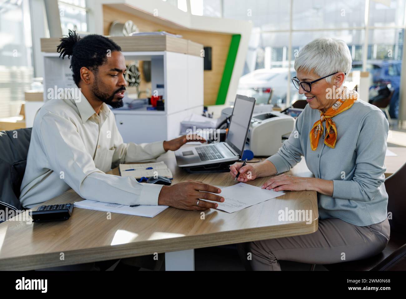 Multi ethnic people doing paperwork hi-res stock photography and images ...