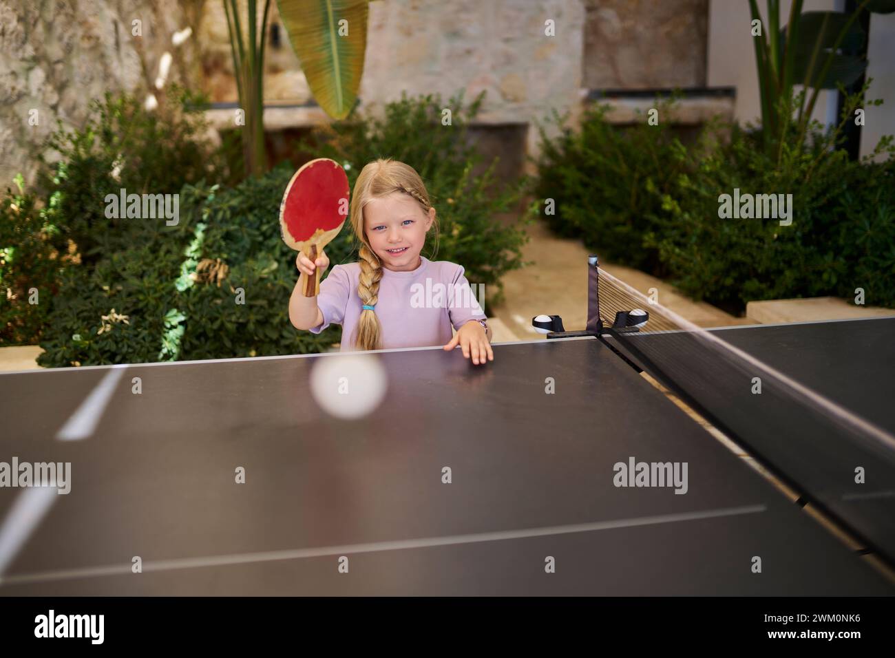 Table tennis children indoors hi-res stock photography and images - Alamy