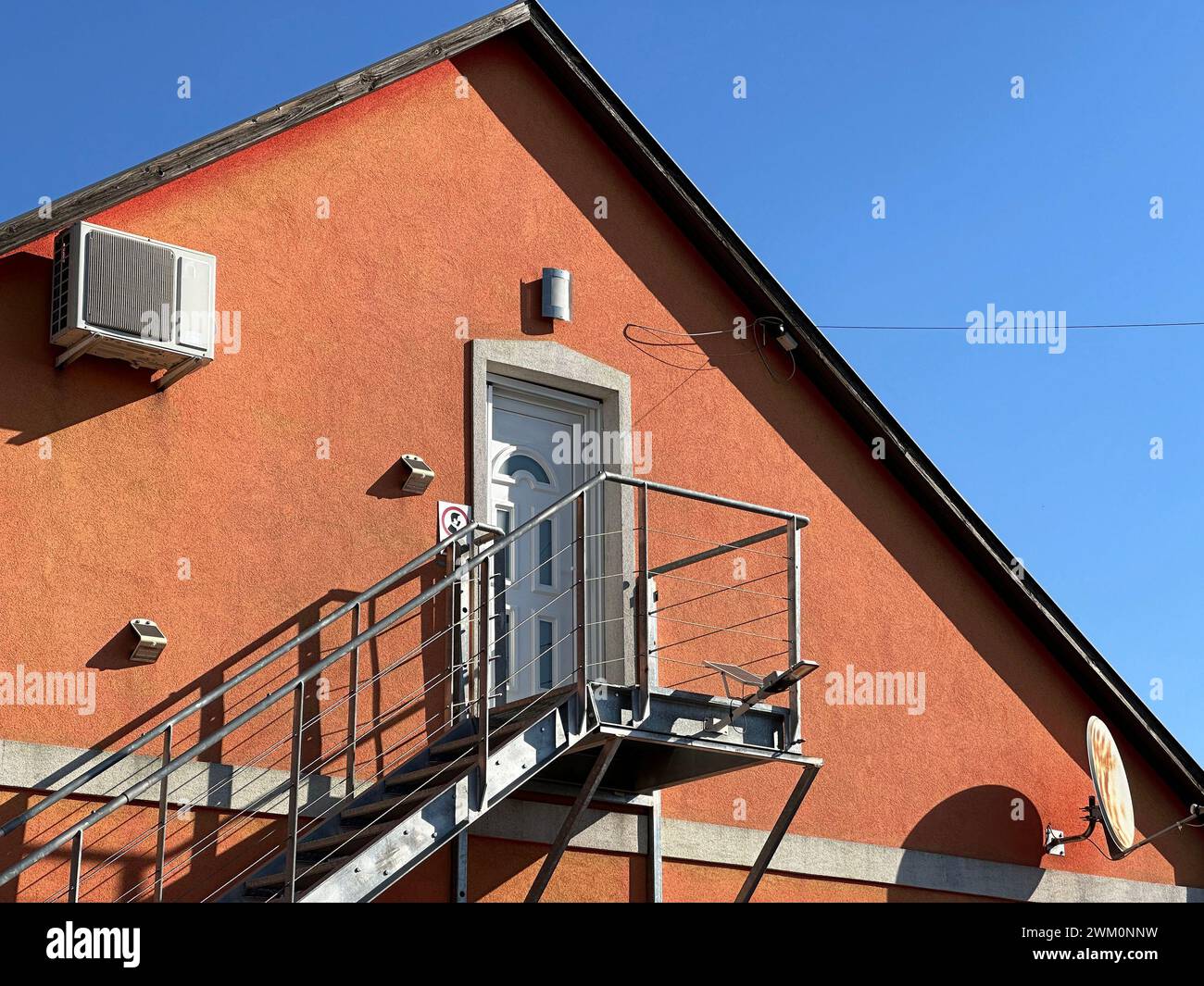 Outside ladder on a house Stock Photo - Alamy