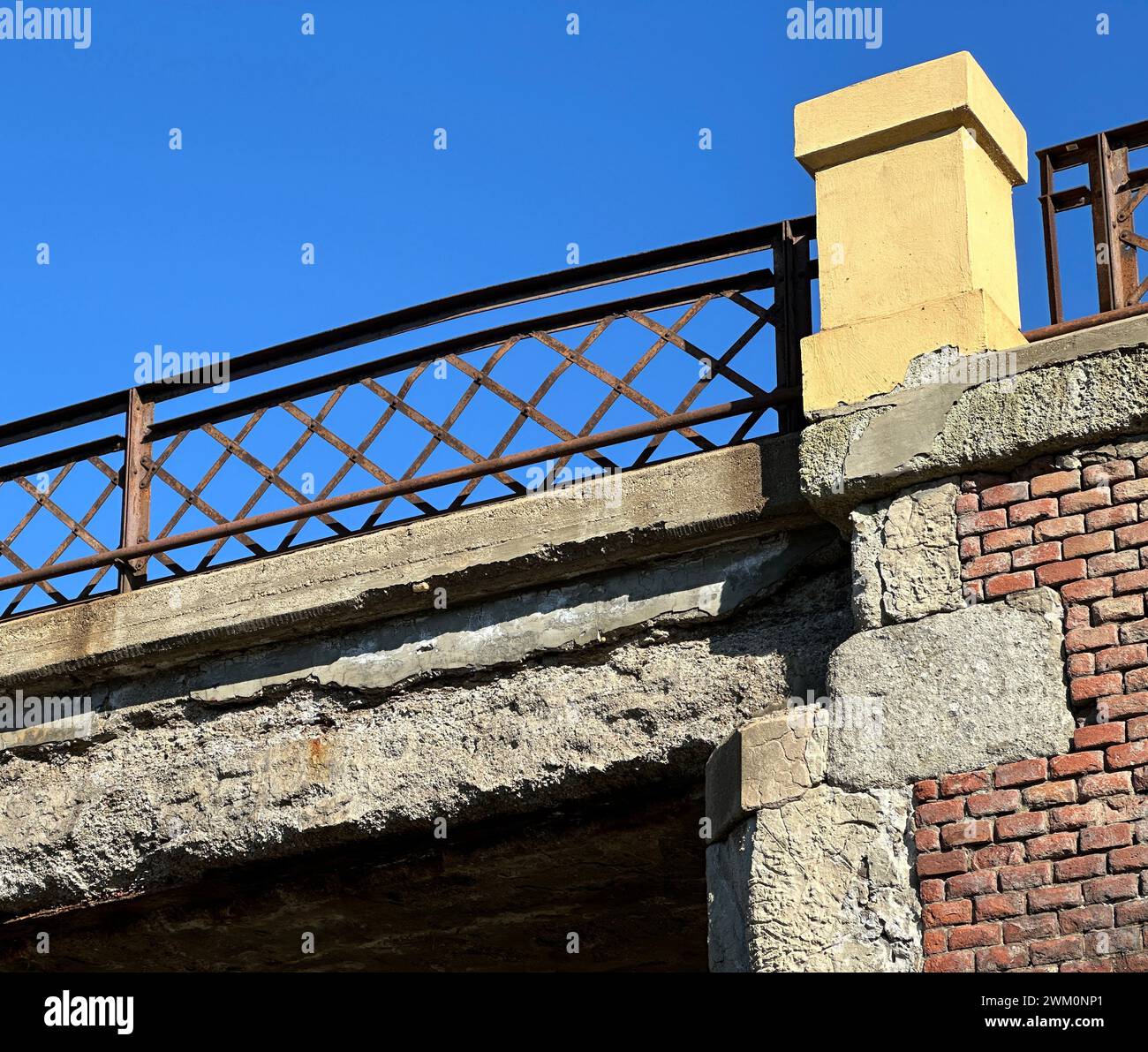 Old damaged bridge in the city Stock Photo - Alamy
