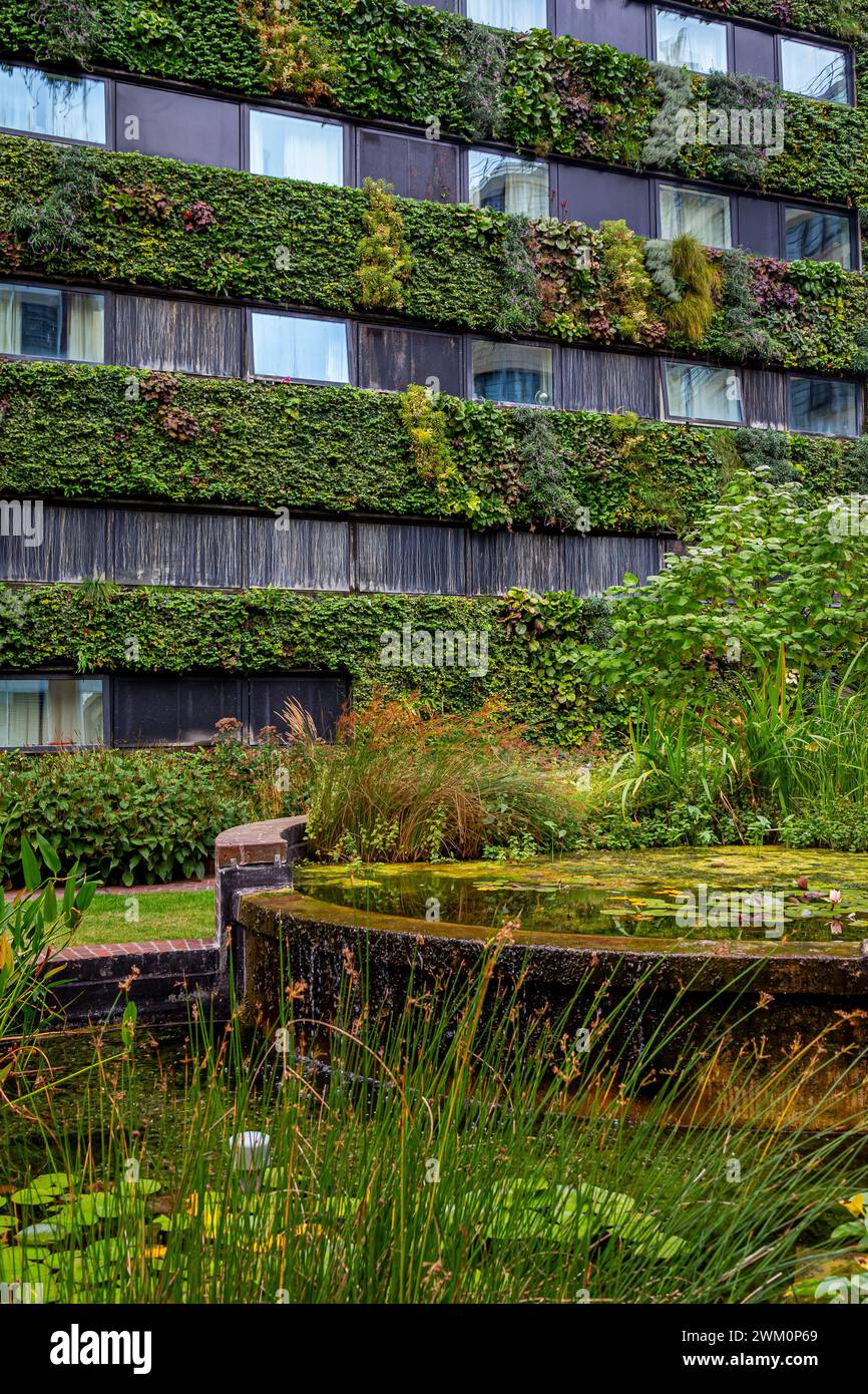 Modern building facade lush vertical hi-res stock photography and ...