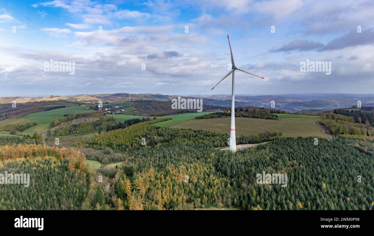 Aerial view of lone wind turbine surrounded by trees Stock Photo - Alamy
