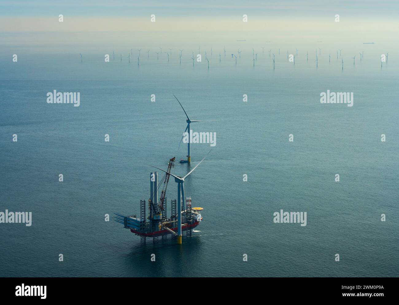 Netherlands, North Holland, IJmuiden, Aerial view of wind turbine ...
