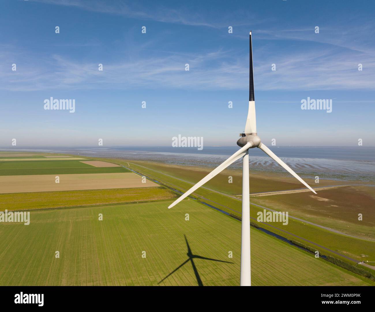Experimental wind turbine with one blade painted black to reduce ...