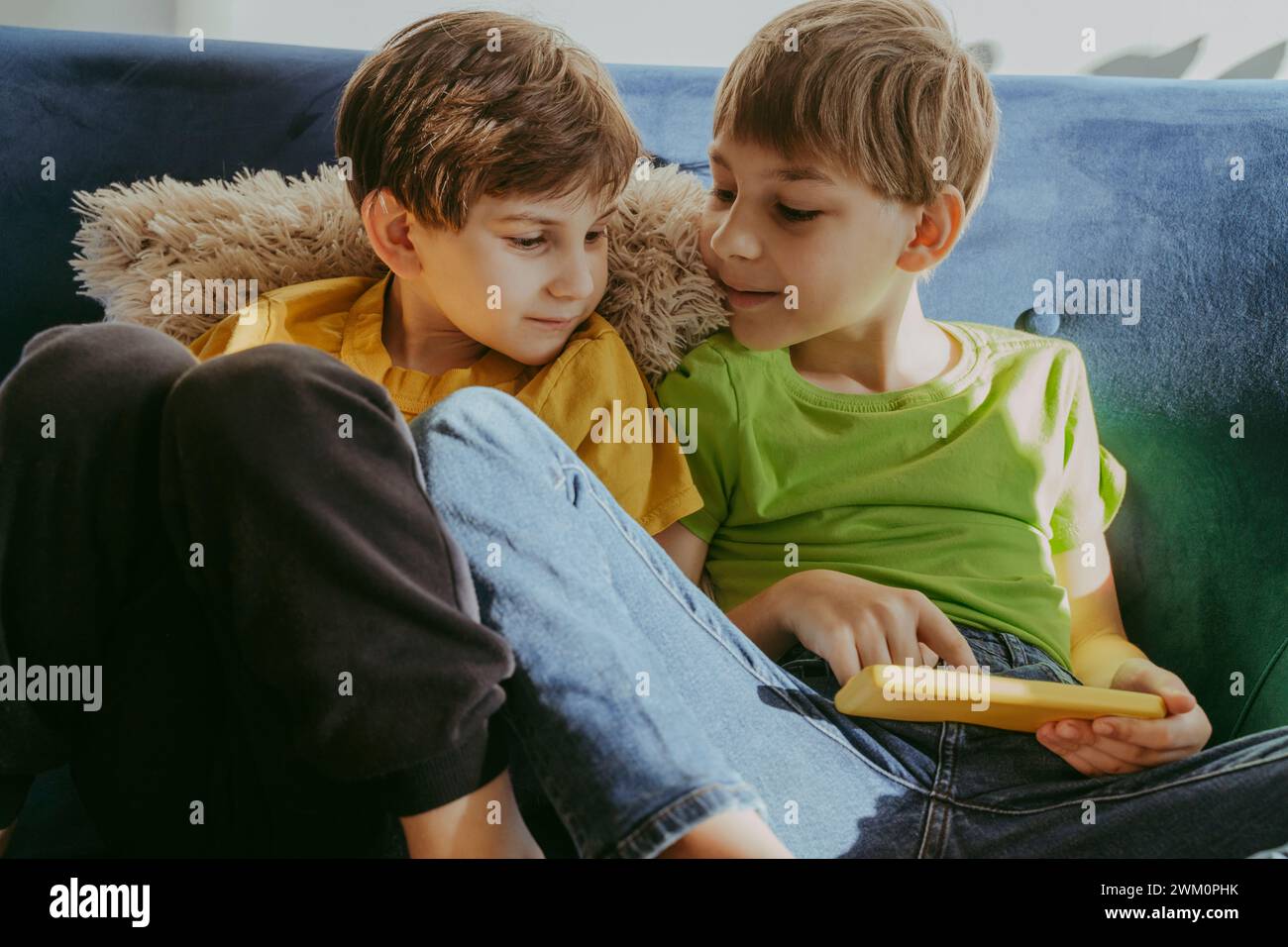 Siblings sharing hi-res stock photography and images - Alamy