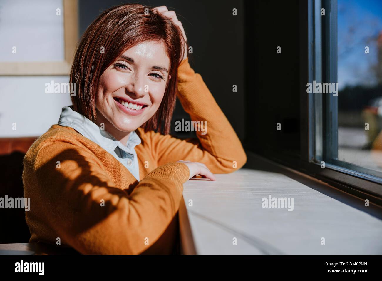 Happy woman enjoying sunlight hi-res stock photography and images - Alamy