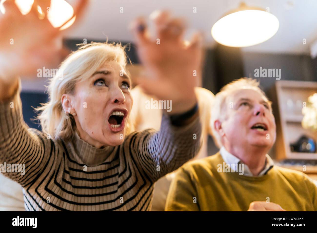 Screaming at tv hi-res stock photography and images - Alamy
