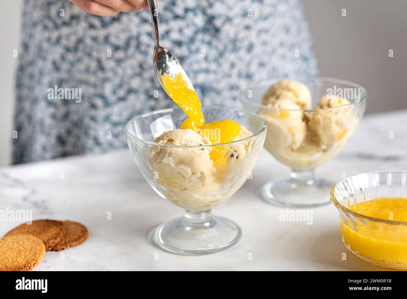 Woman preparing ice cream hi-res stock photography and images - Alamy