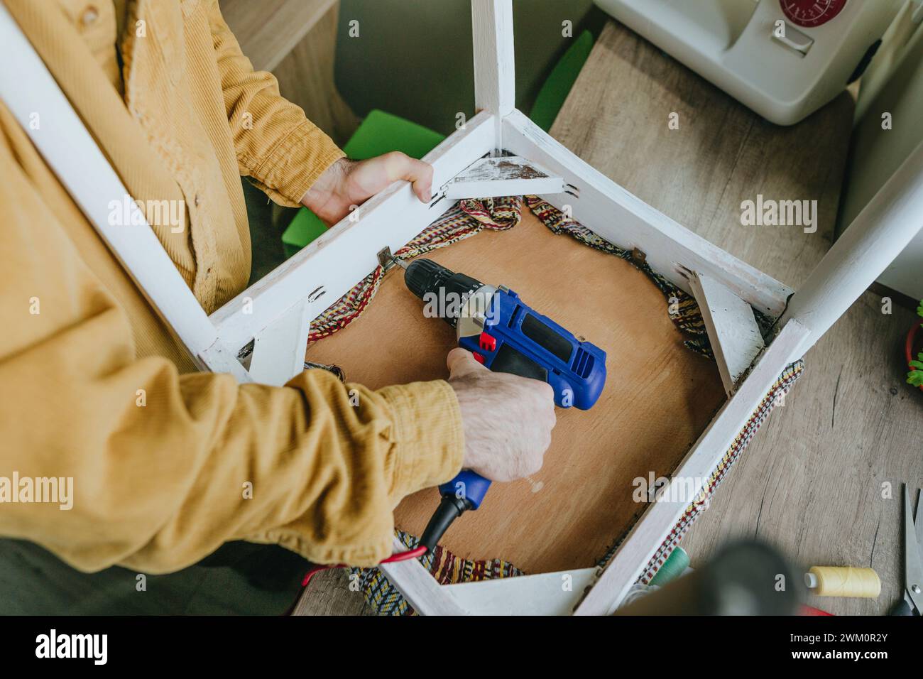 Man using power drill hi-res stock photography and images - Alamy