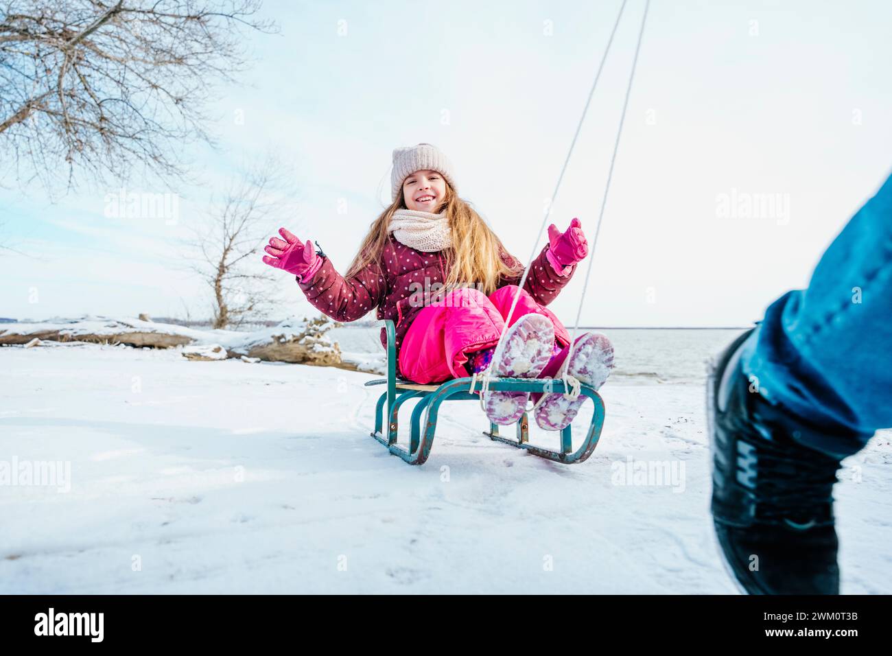 Girl and sled hi-res stock photography and images - Alamy