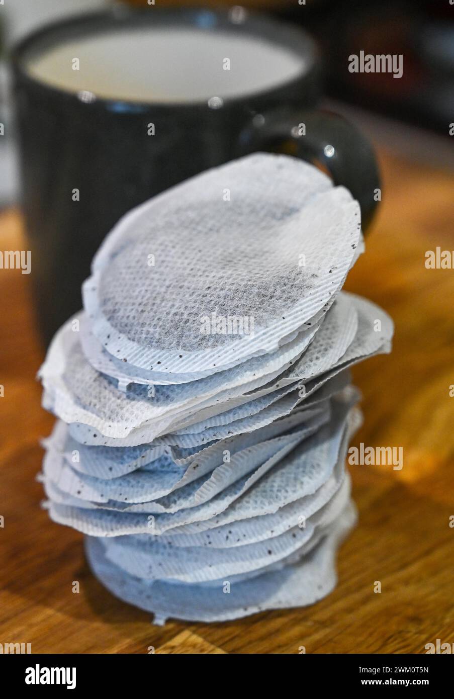 Circle shaped tea bags ready for making a cup of tea in the kitchen of ...