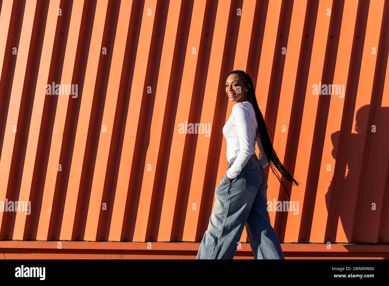 One happy woman walking in sunshine hi-res stock photography and images ...