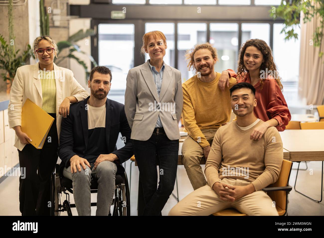 Smiling diverse business colleagues in workplace Stock Photo - Alamy