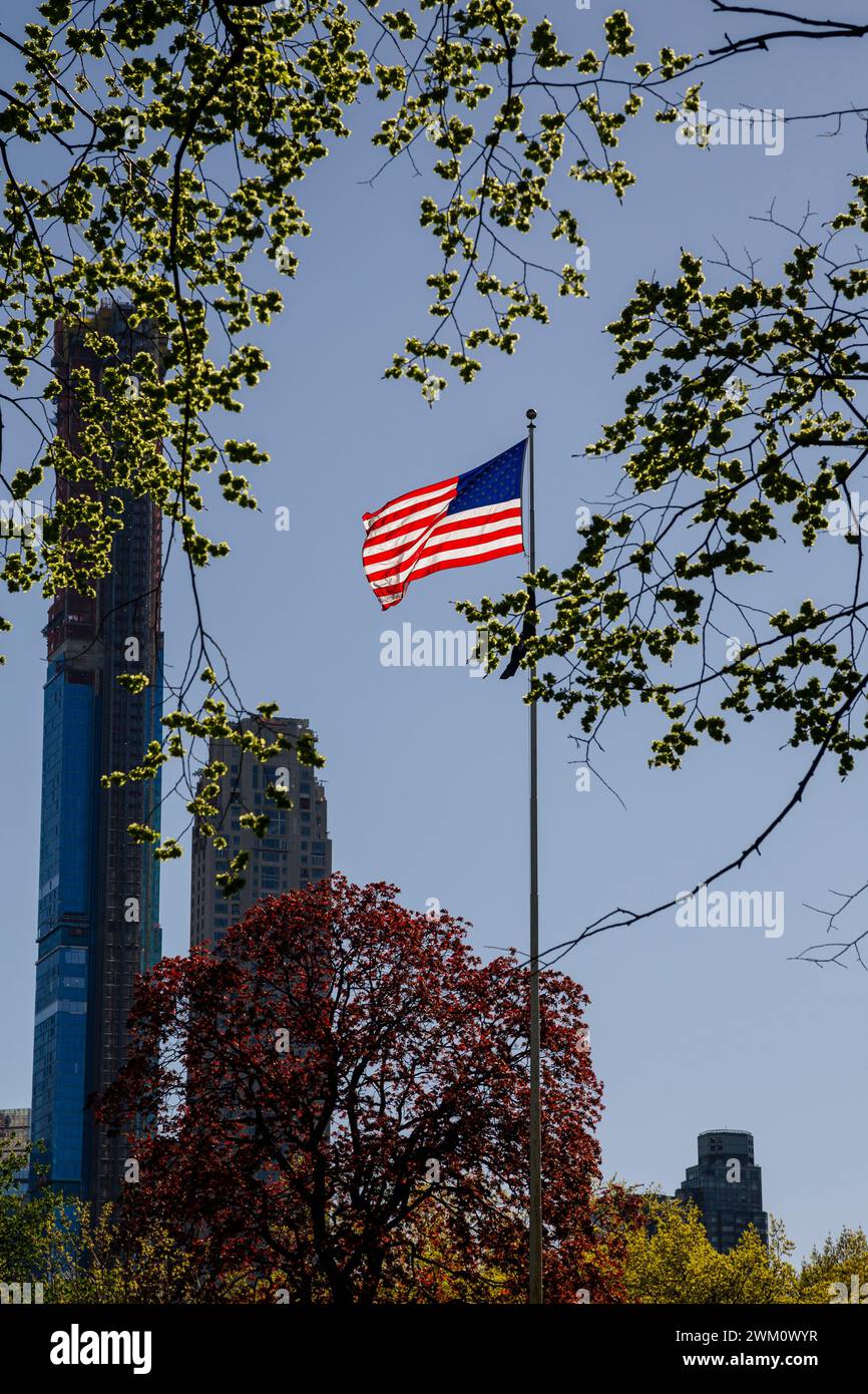USA, New York State, New York City, American flag on flagpole in ...