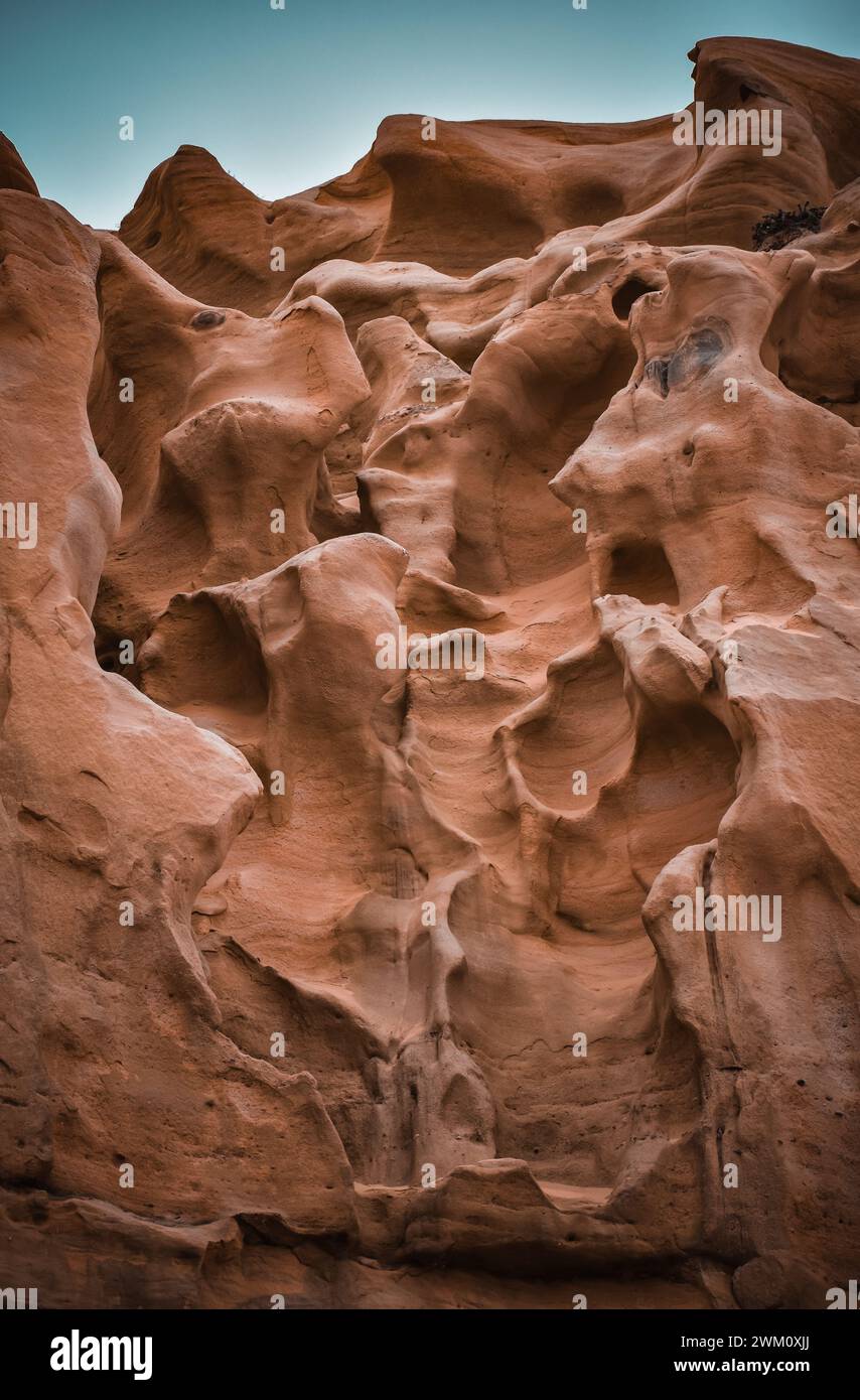 Wind and water worn cliff Stock Photo - Alamy