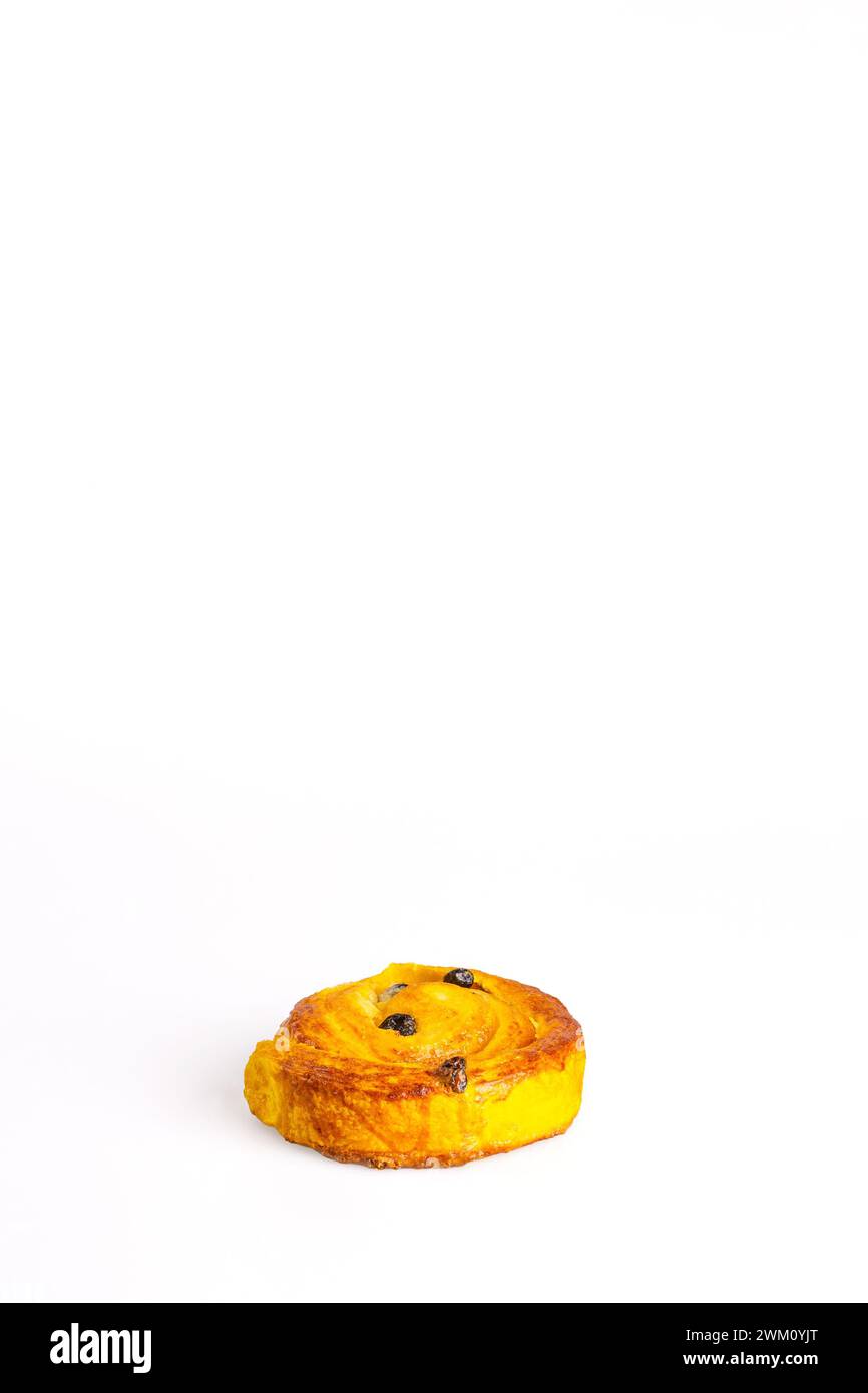 A delicious single fresh out of the oven golden brown raisin swirl ...