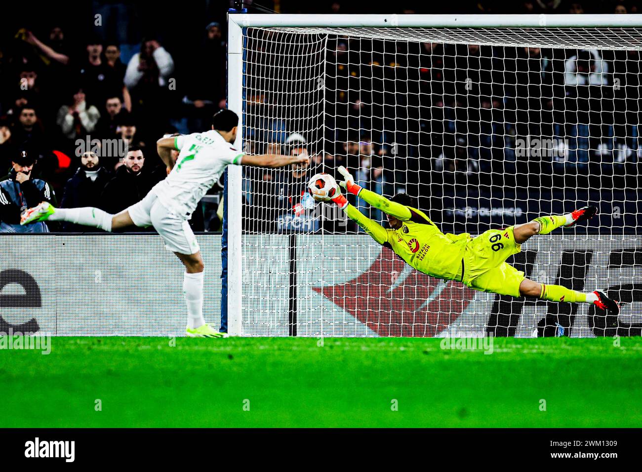 Roma’s Belgian goalkeeper Mile Svilar saves the penalty of Feyenoord's ...