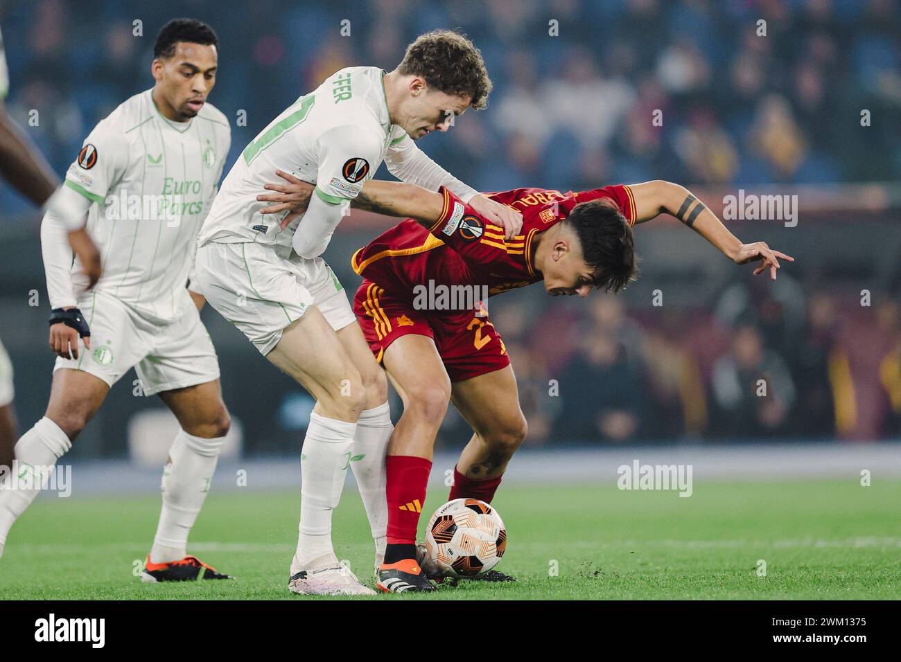 Feyenoord's Dutch midfielder Mats Wieffer challenges for the ball with ...