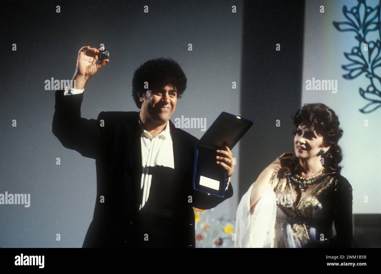 4066427 Director Pedro Almodovar receiving from actress Gina ...