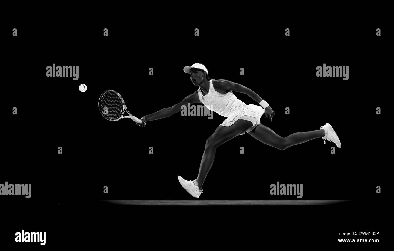 Dynamic photo of tennis player jumping to hit overhead shot in motion ...