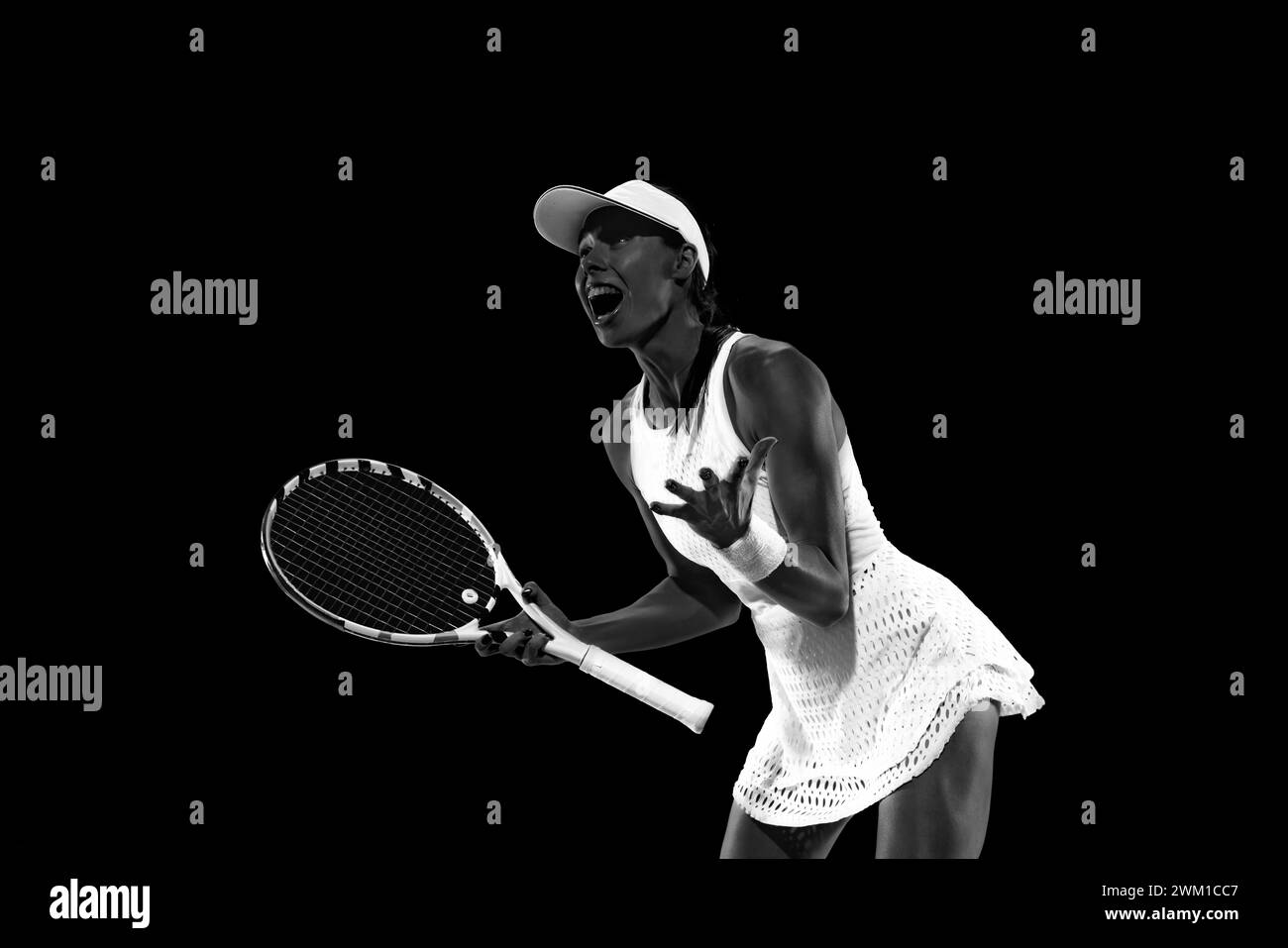 Successful match. Tennis player holds racquet and expressing joy and ...