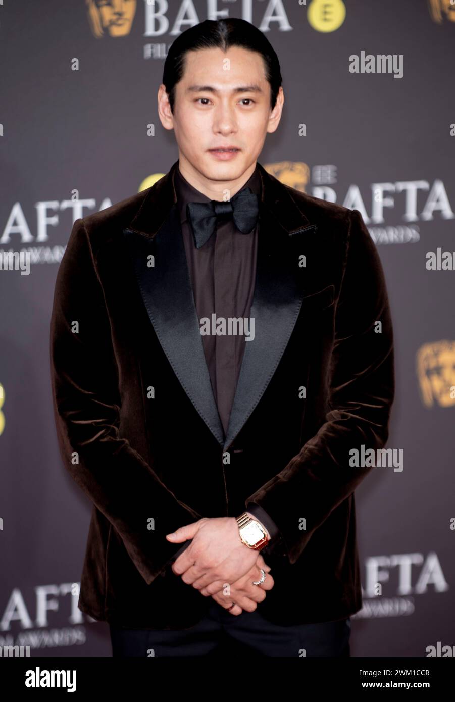 Teo Yoo at the 77th British Academy Film Awards, Royal Festival Hall ...