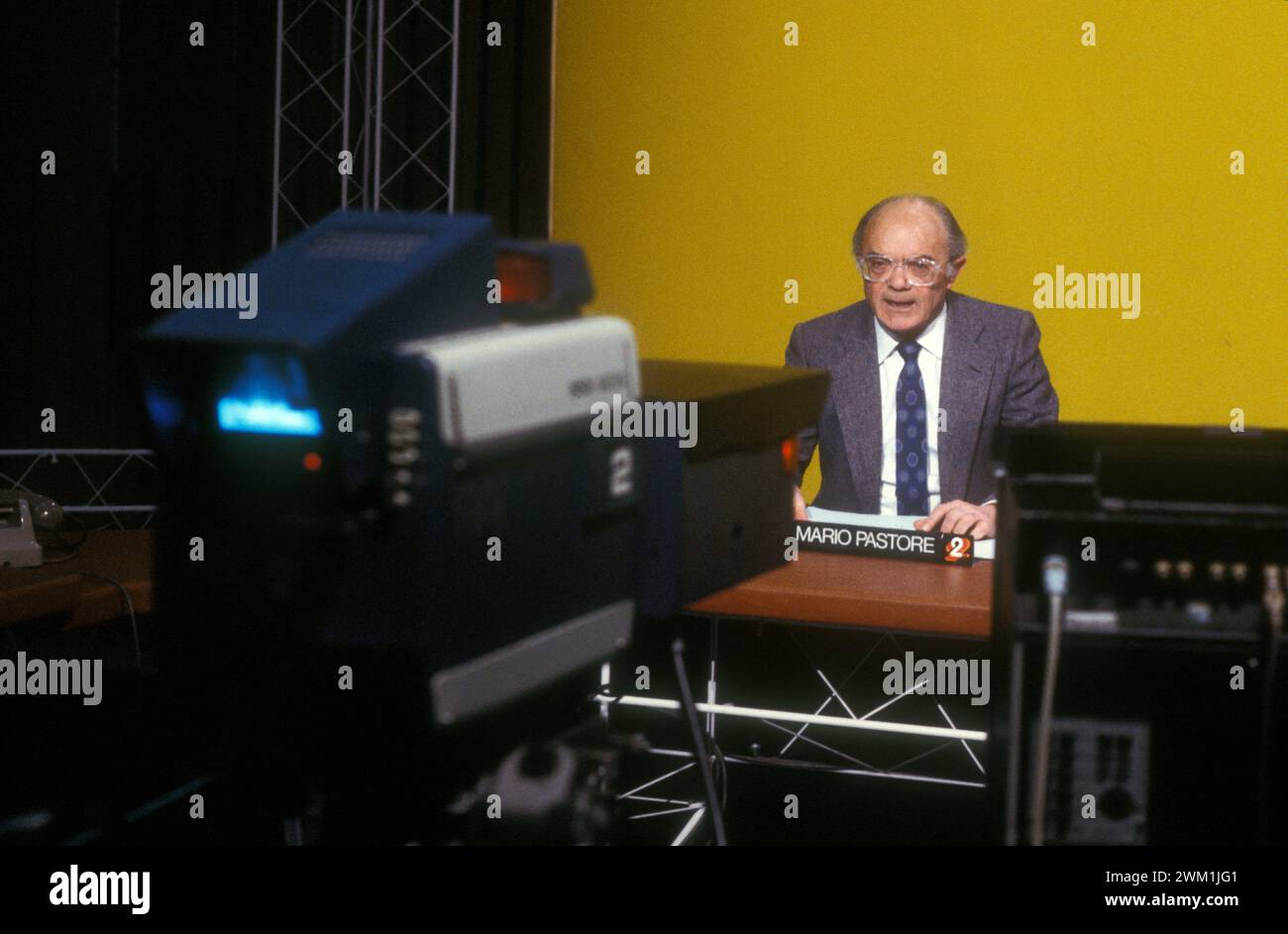 4069735 Italian TV journalist Mario Pastore in the studio of TV news TG ...