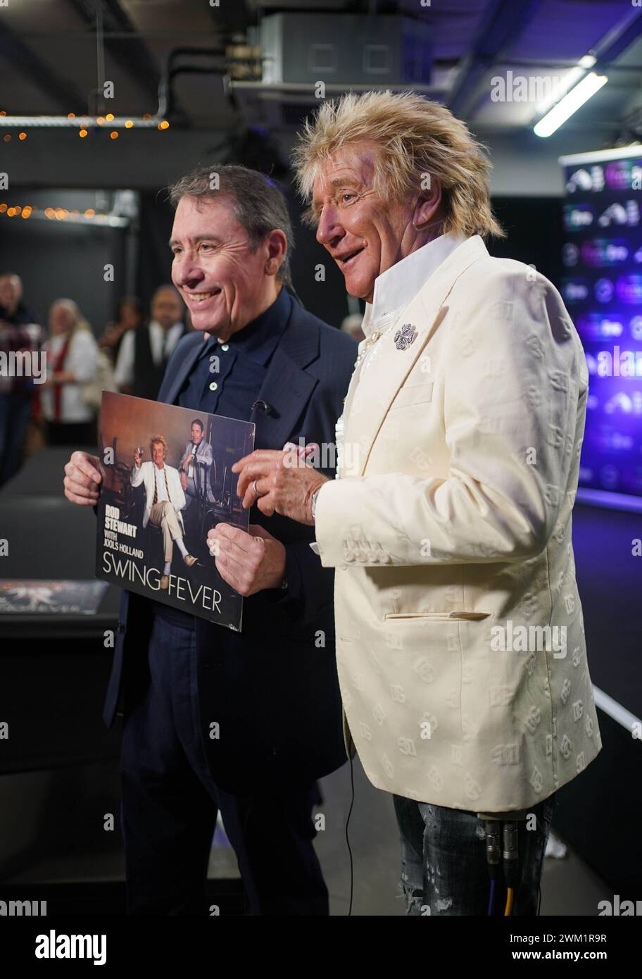 Jools Holland (left) and Rod Stewart during a signing session for their ...
