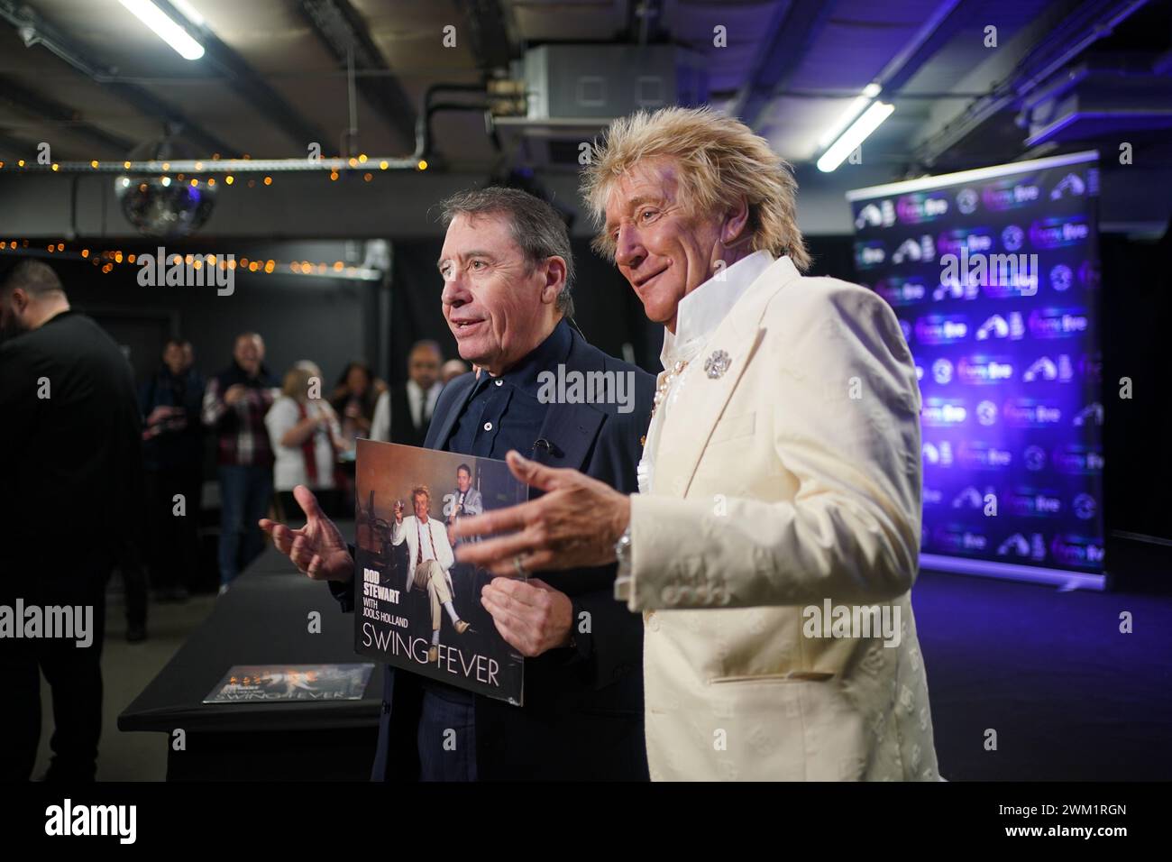 Jools Holland (left) and Rod Stewart during a signing session for their ...
