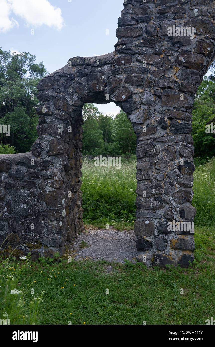 Entrance to the former Reich Labor Service camp, a gate made of basalt ...