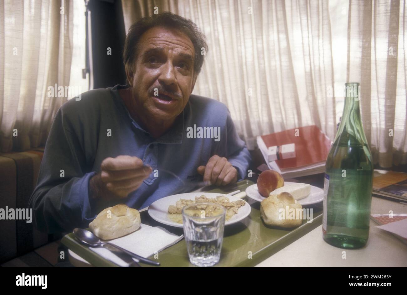 Italian actor eating hi-res stock photography and images - Alamy