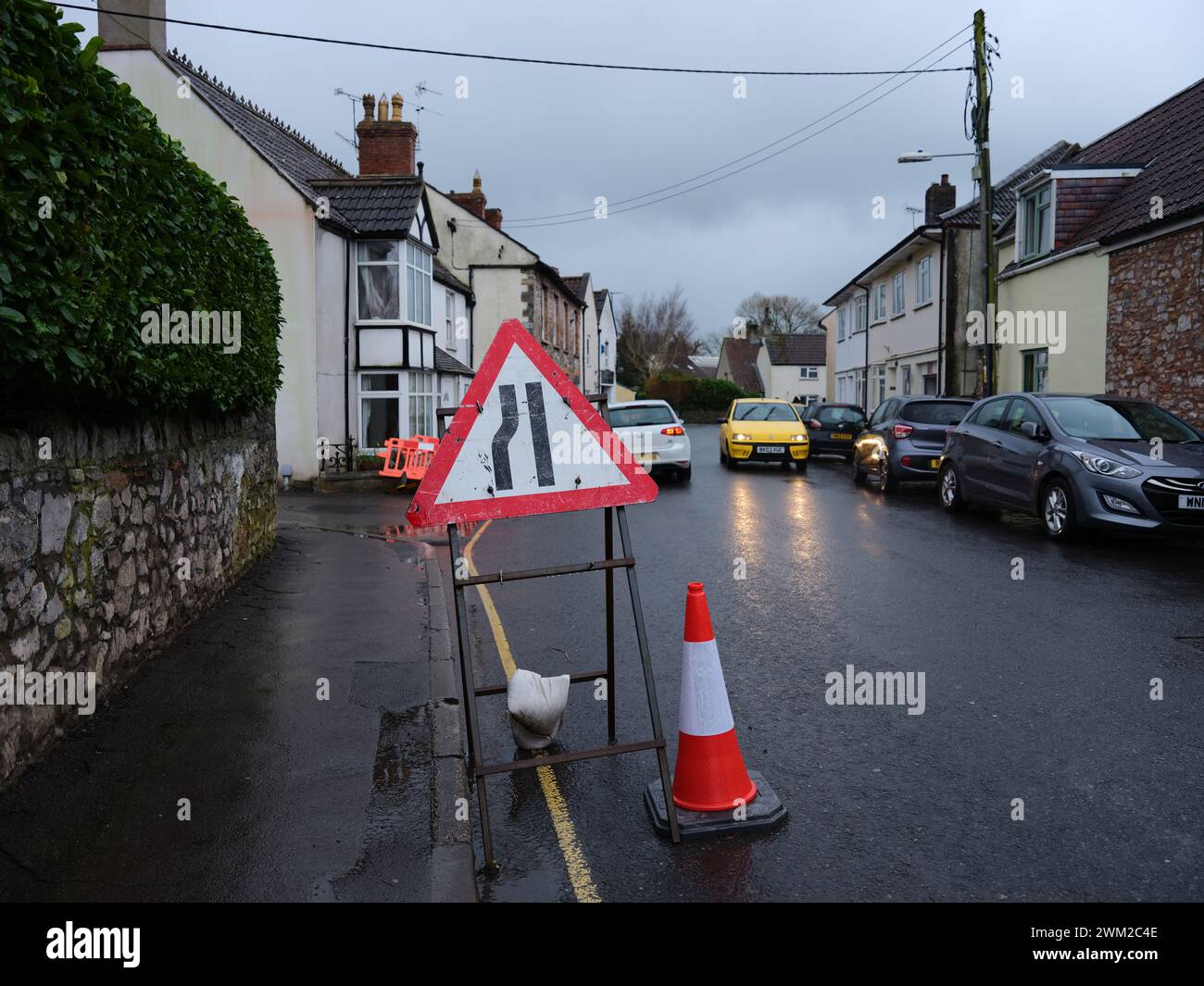 February 2024, Road works on a wet day on Cheddar, Somerset, England ...