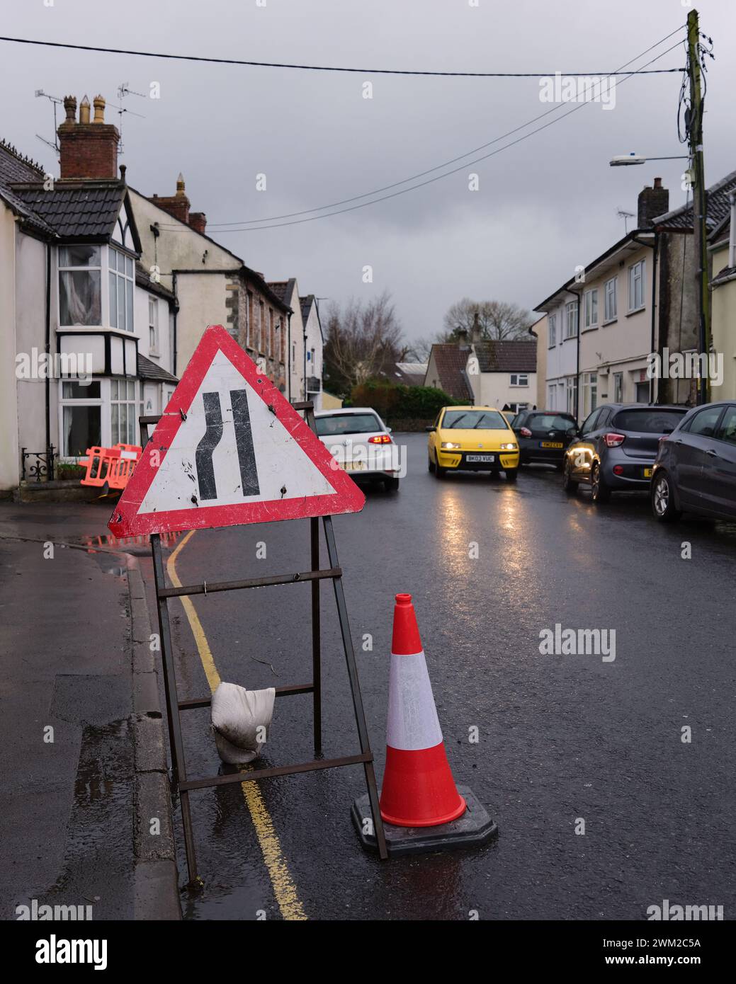 February 2024, Road works on a wet day on Cheddar, Somerset, England ...