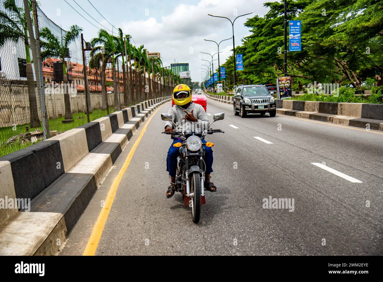 Despatch rider in Lagos Nigeria Stock Photo - Alamy
