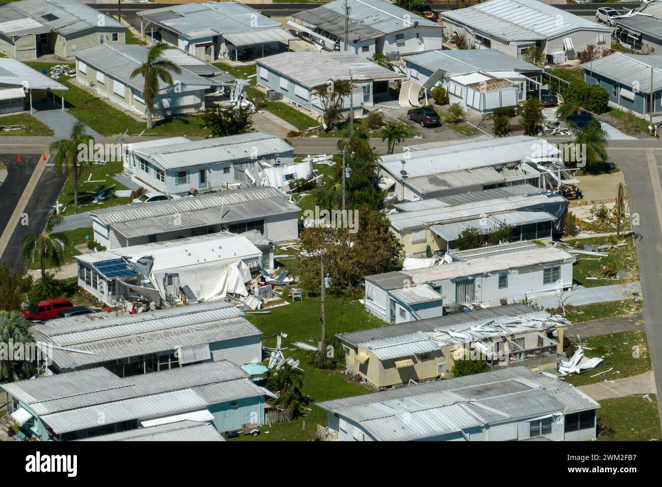 Aerial view of natural disaster consequences in Florida Southwest region. Severely damaged by ...