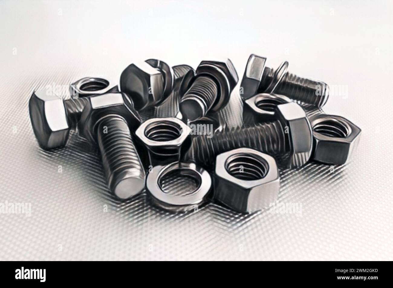 a stack of nuts and bolts on a metal plate Stock Photo - Alamy