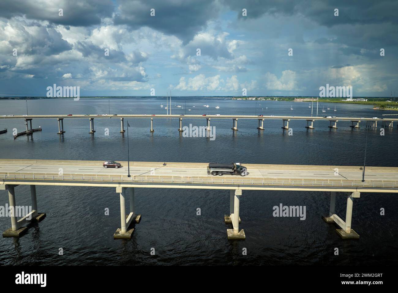 Barron Collier Bridge and Gilchrist Bridge in Florida with moving ...