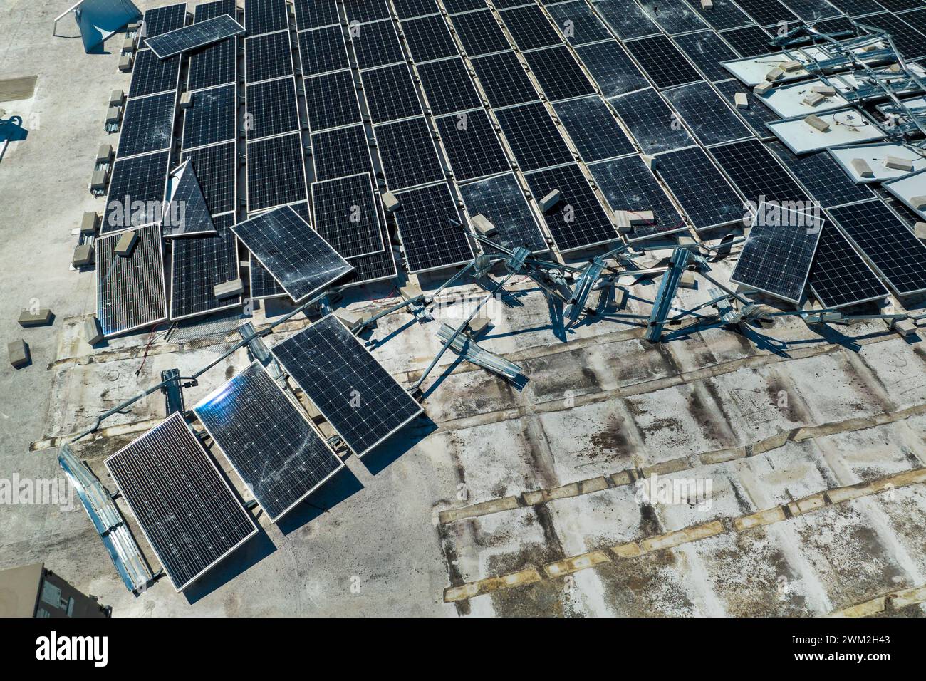 Broken down photovoltaic solar panels destroyed by hurricane Ian winds ...