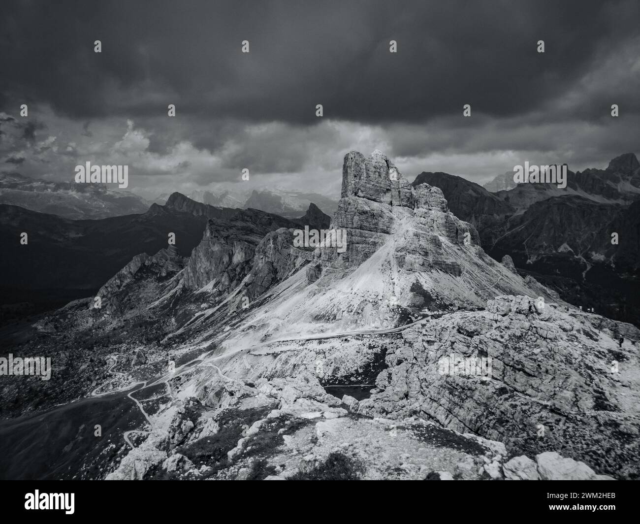 Mountains tower in the Italian alps in South Tyrol in black and white ...